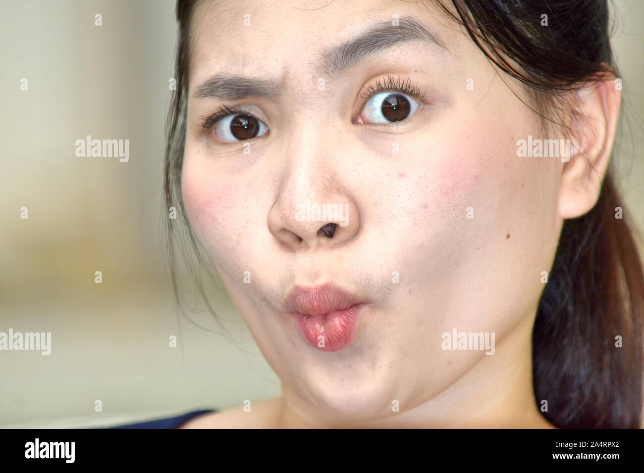 Chinese Female Kissing Stock Photo - Alamy