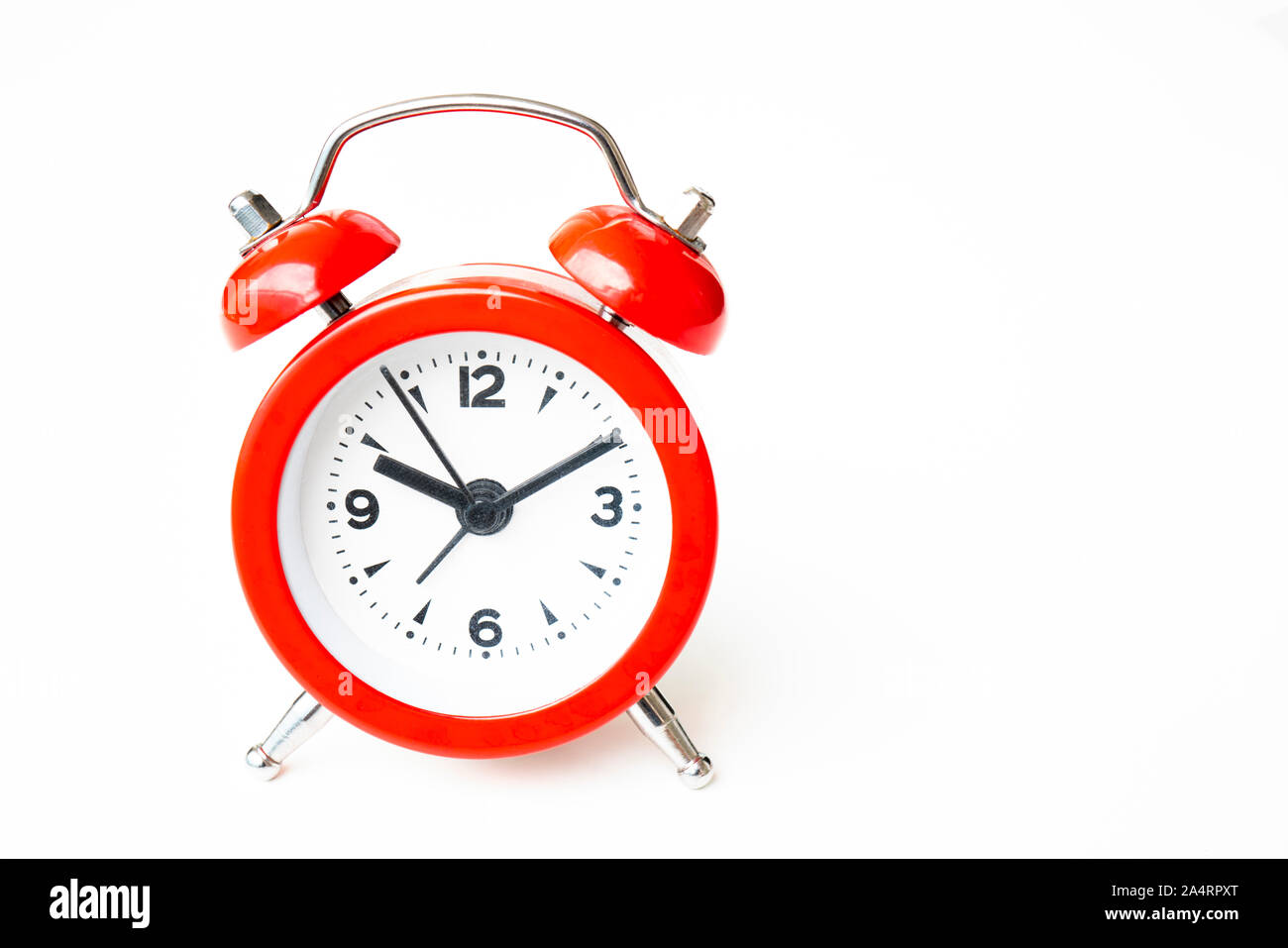 close up of a vintage red bell clock on white background Stock Photo ...