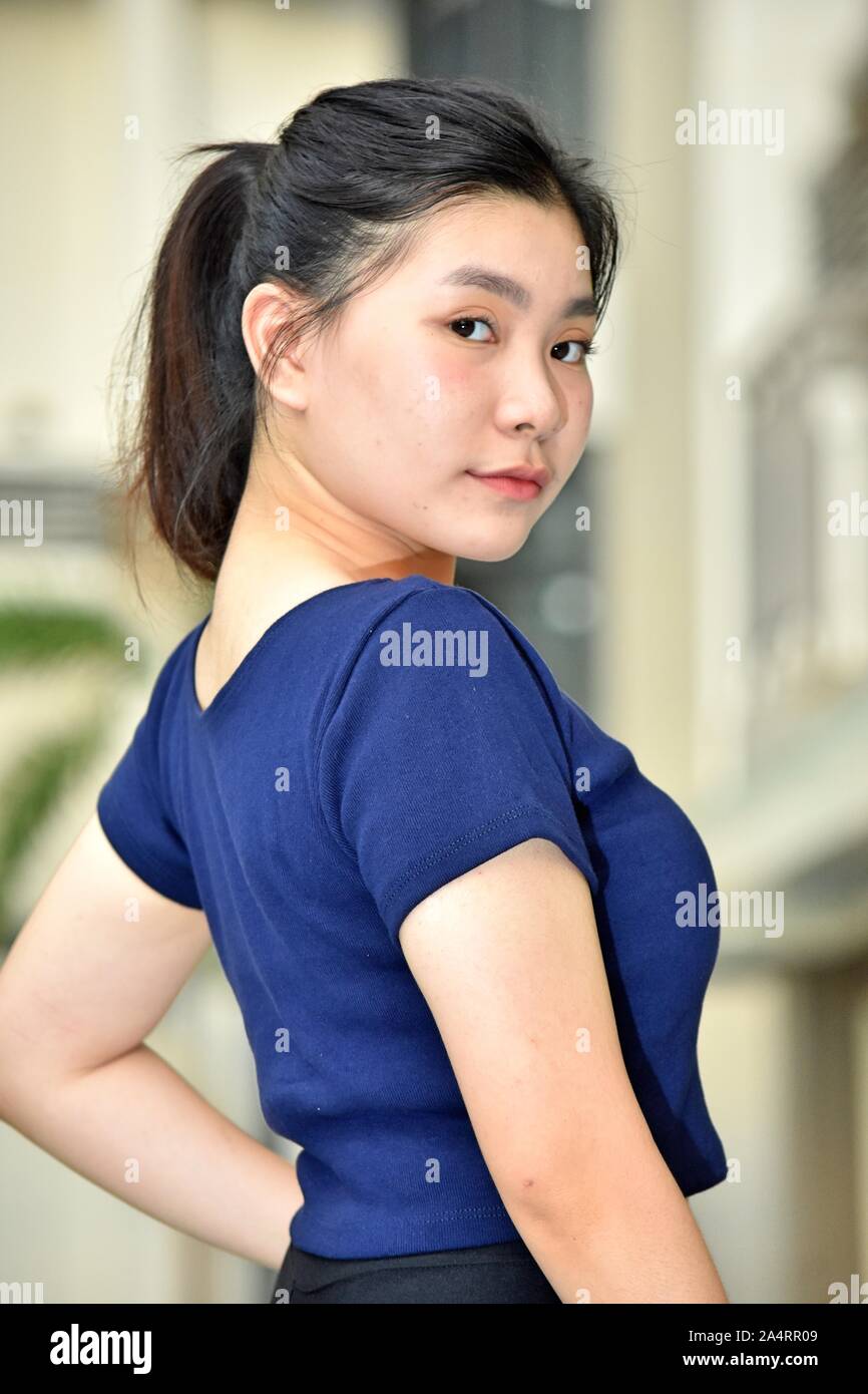An Attractive Chinese Female Posing Stock Photo - Alamy