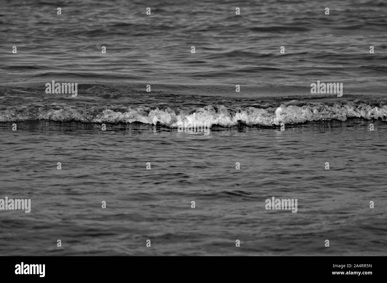 Night water ripple reflections. Black and White background. Dark tone ...