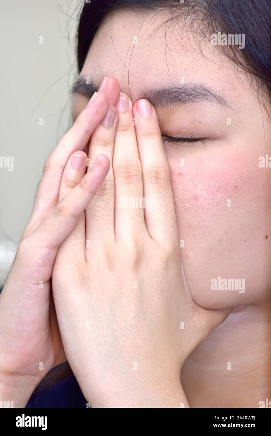 Youthful Chinese Woman And Depression Stock Photo - Alamy