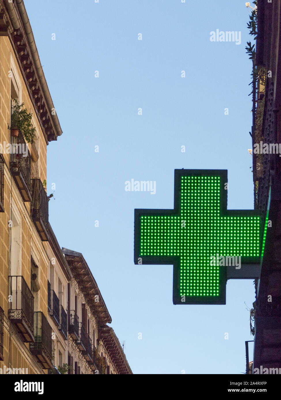 Green cross in a building Stock Photo - Alamy