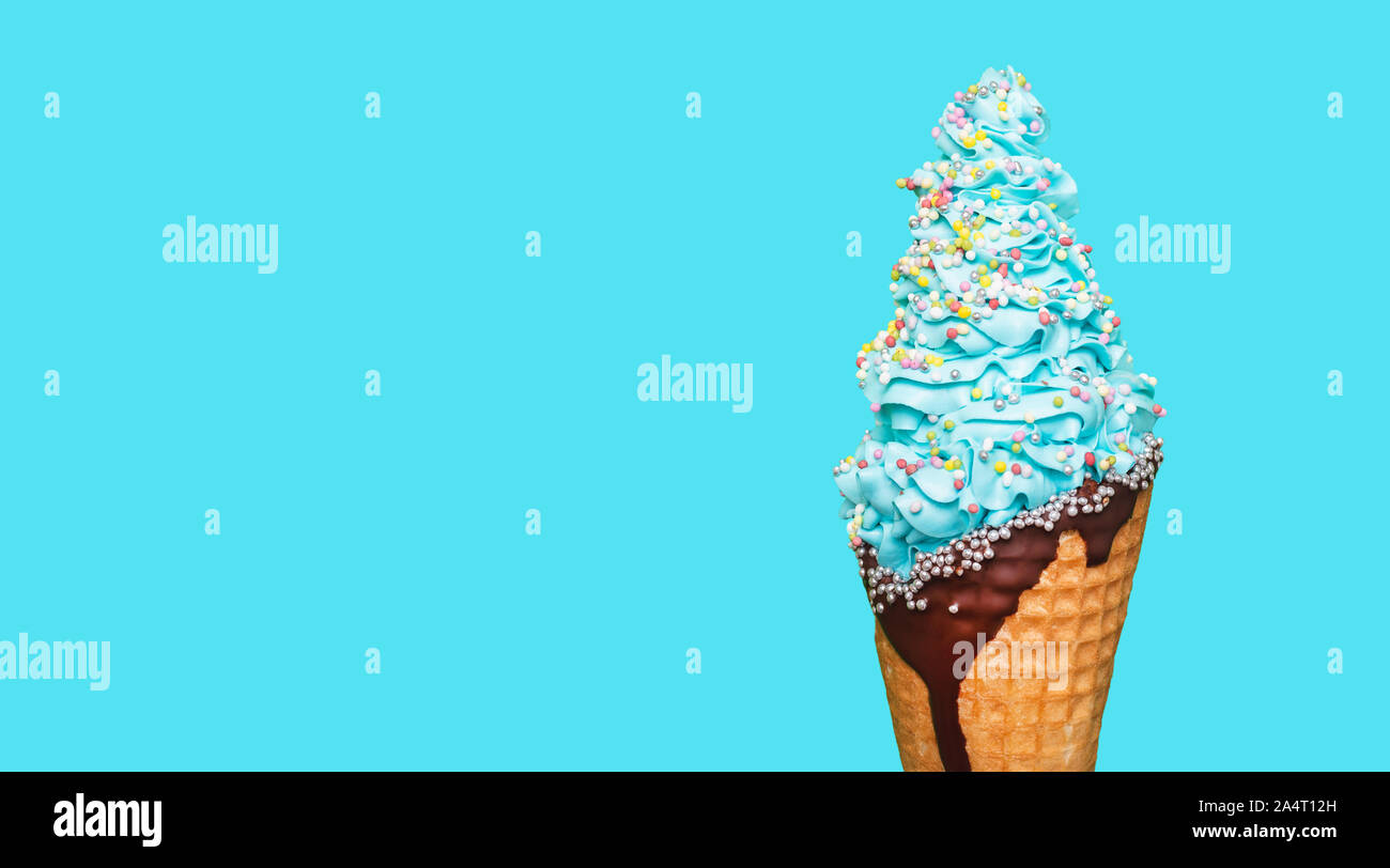 Ice cream cone close-up. Curled ice cream on a wafer with chocolate ...