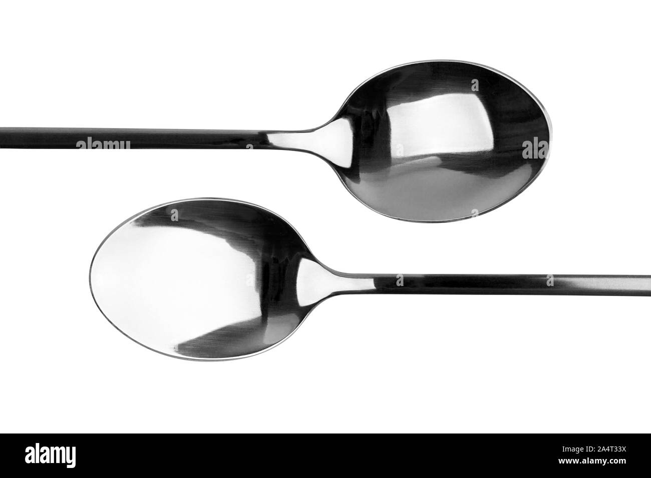 Two silver spoons Black and White Stock Photos & Images - Alamy