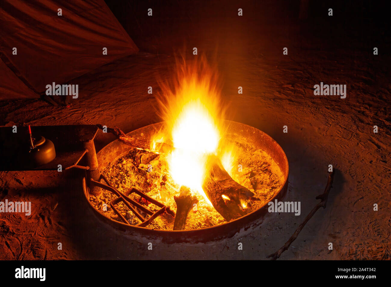 Vivid burning fire in camping fireplace at night Stock Photo - Alamy