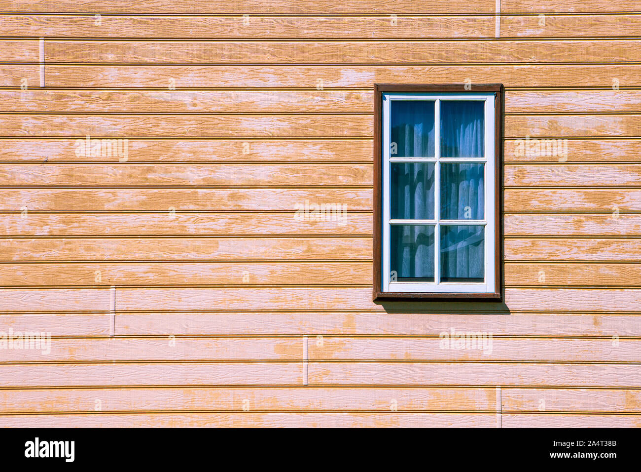 Window on wooden weatherboard wall with copy space Stock Photo - Alamy