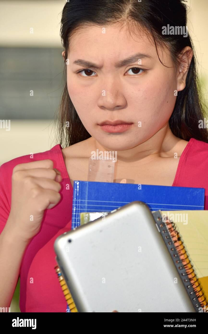 Mad Youthful Girl Student With Books Stock Photo - Alamy