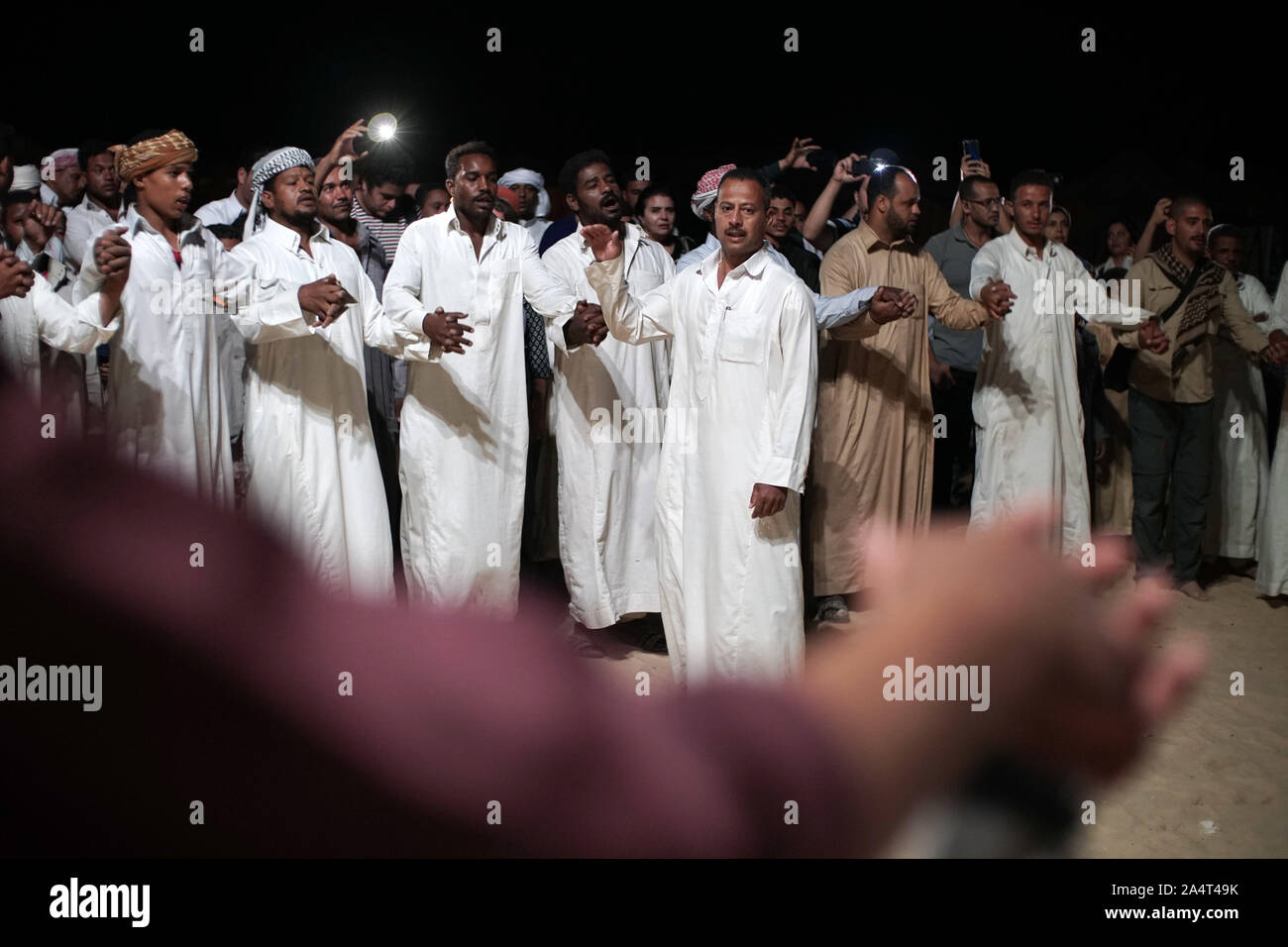 Hundreds of Siwan people form the Sufi circle of forgiveness, marking ...