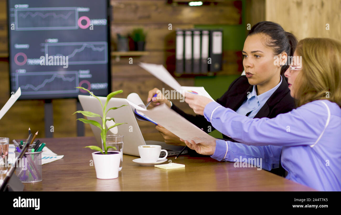 Business woman looking infographic in hi-res stock photography and ...