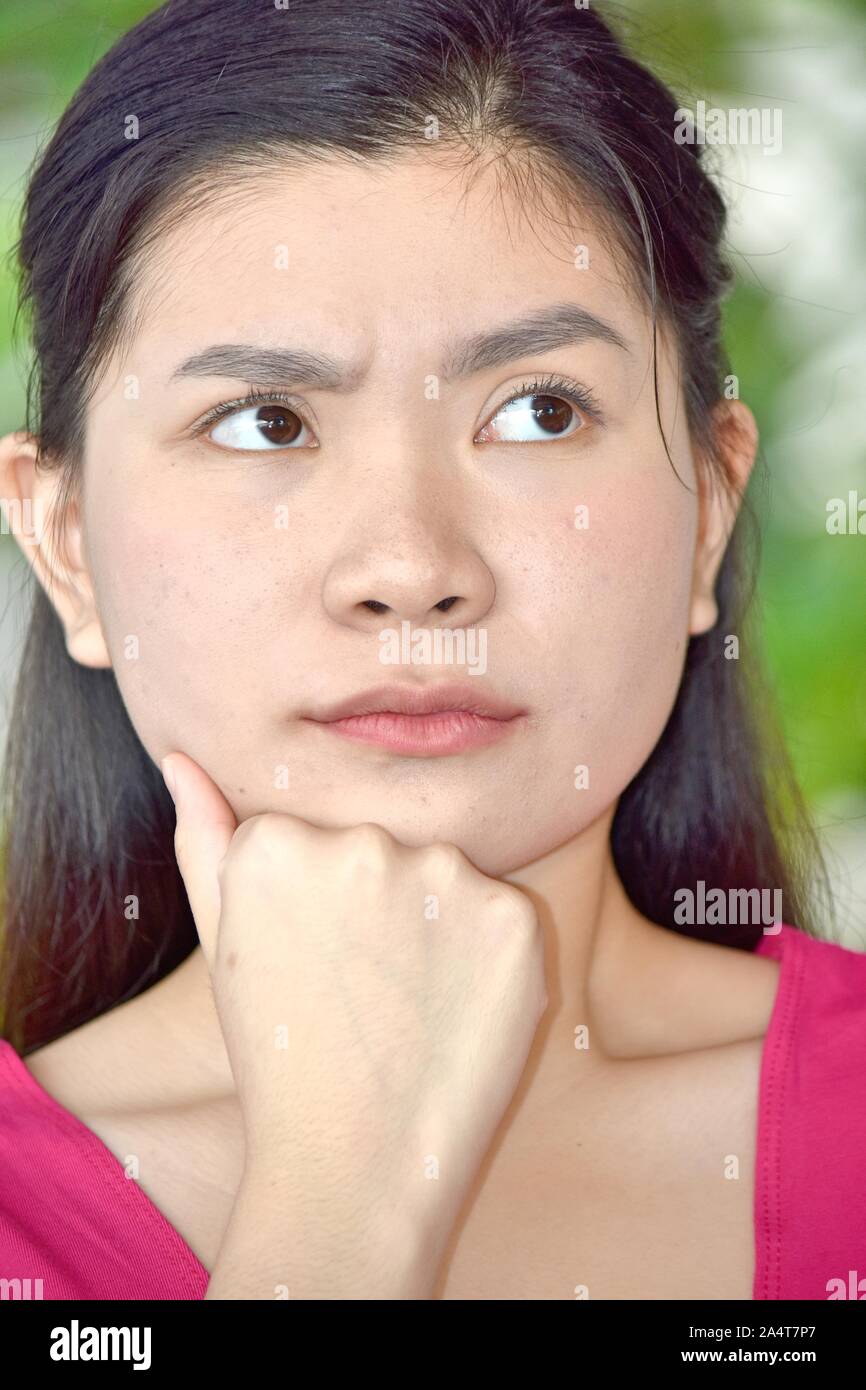 Young Diverse Adult Female Thinking Stock Photo - Alamy