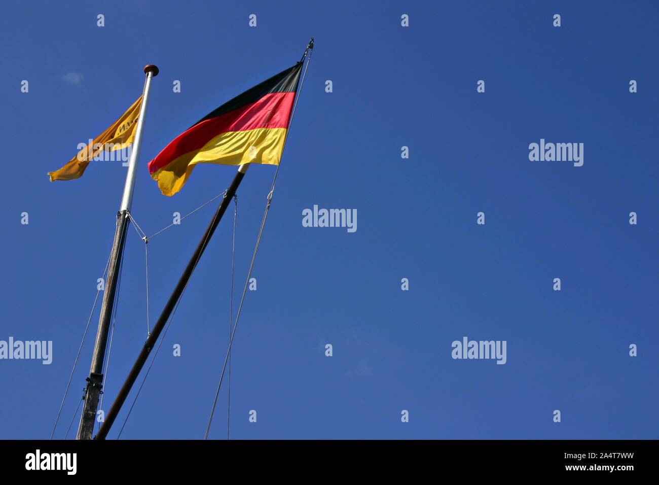 two flags with blue sky background Stock Photo - Alamy