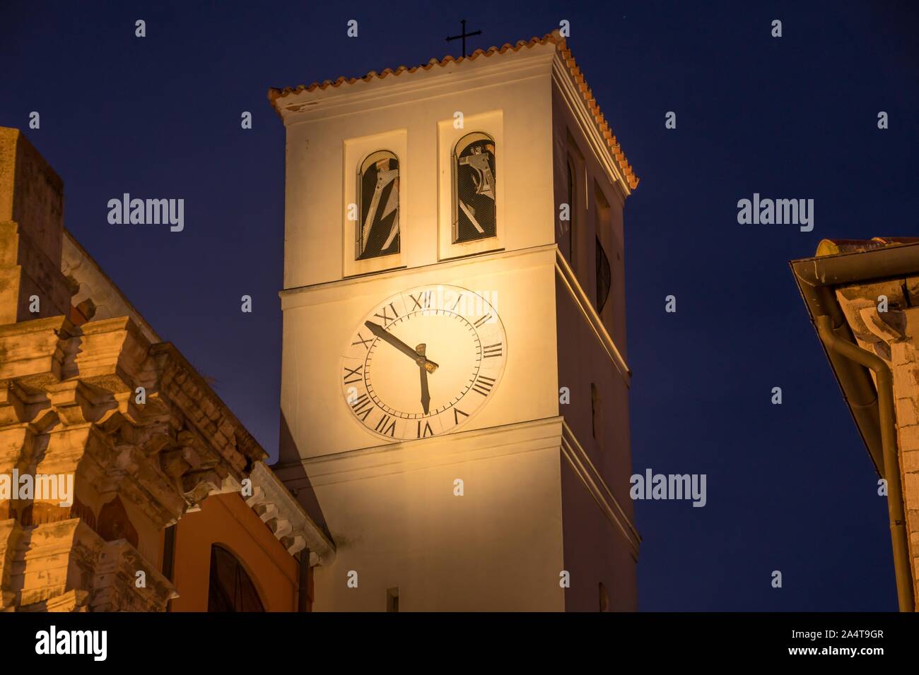 Ancient clock tower at night in the Italian city Stock Photo - Alamy