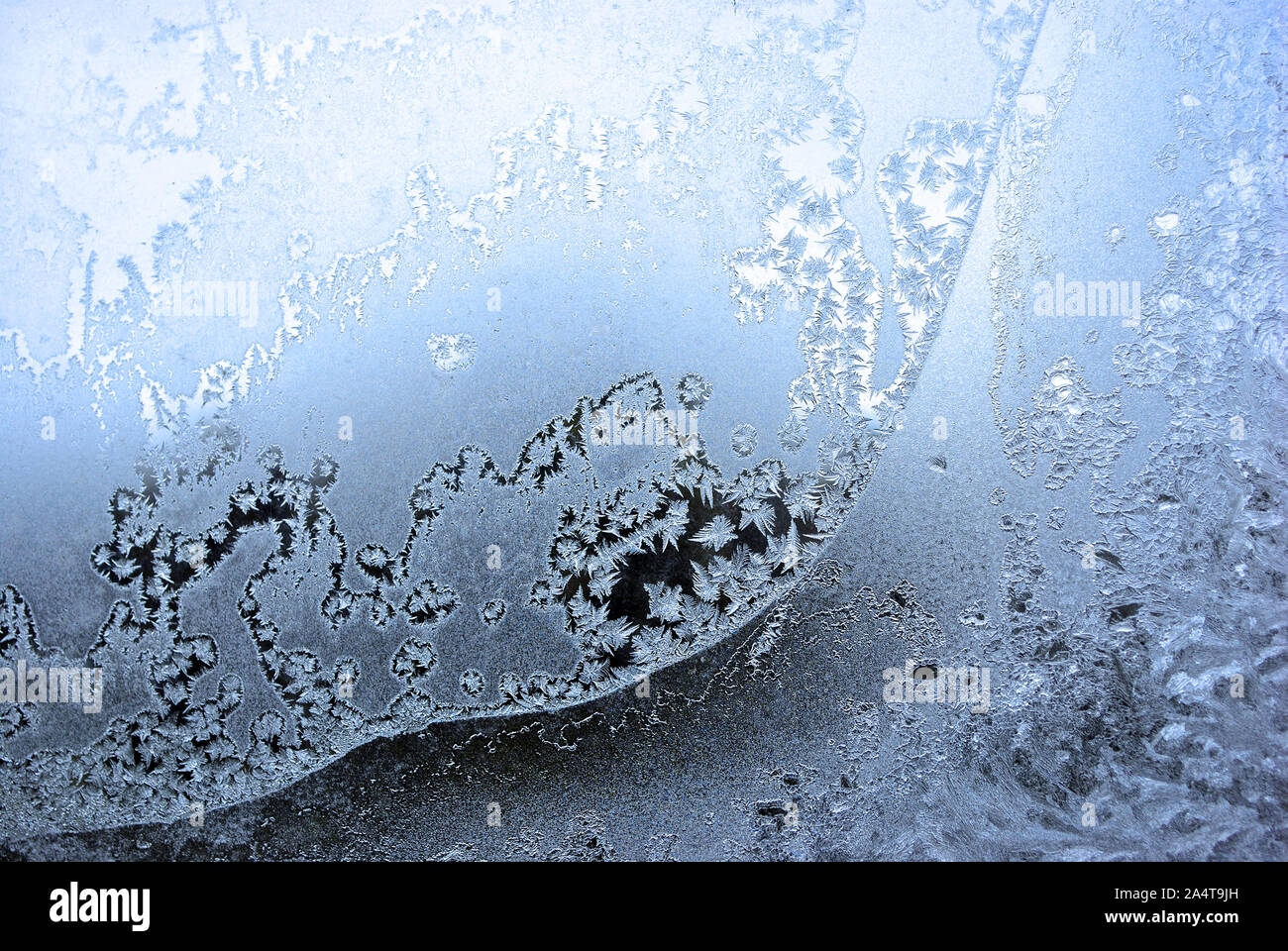 Ice on the window glass, natural background texture close-up detail ...