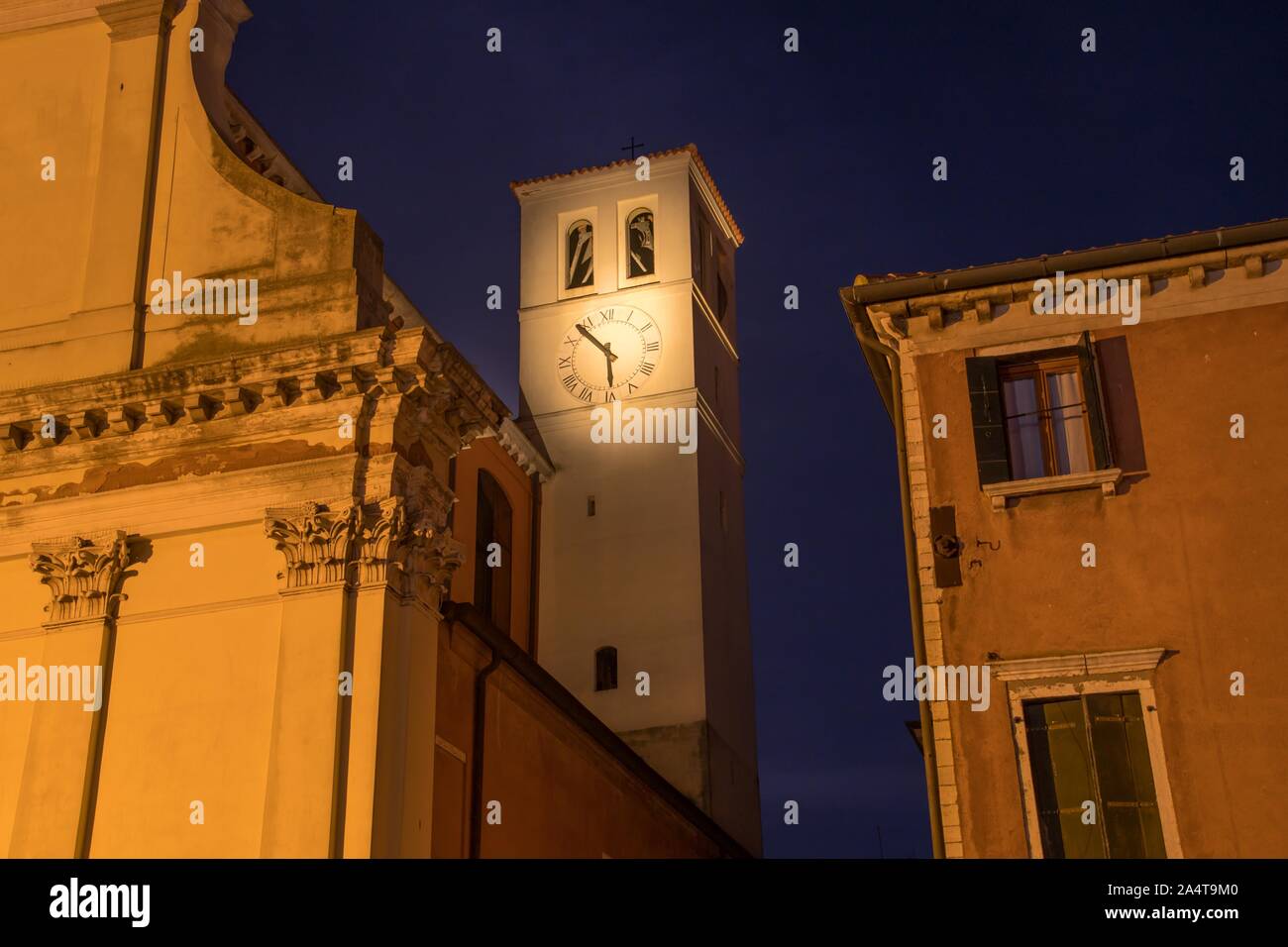Ancient clock tower at night in the Italian city Stock Photo - Alamy