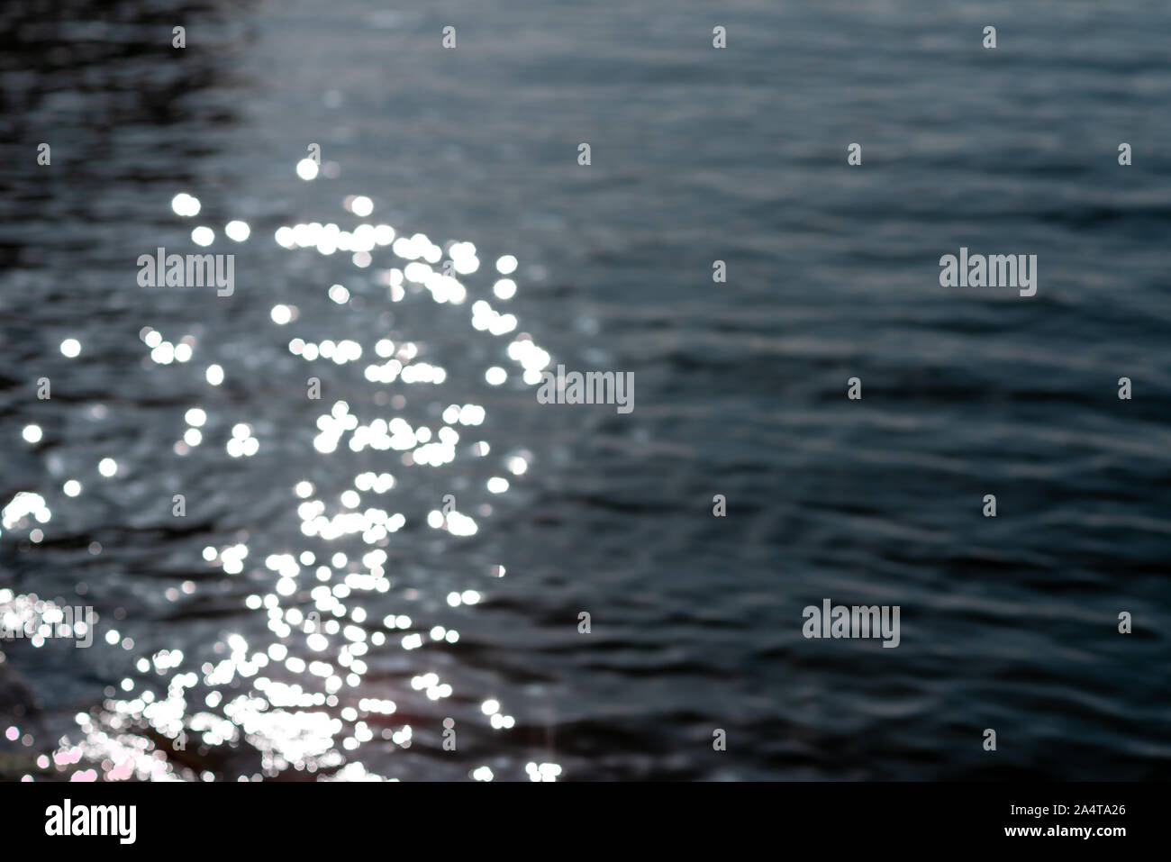 Shiny texture of glares and sunlight. Blue shiny water texture ...