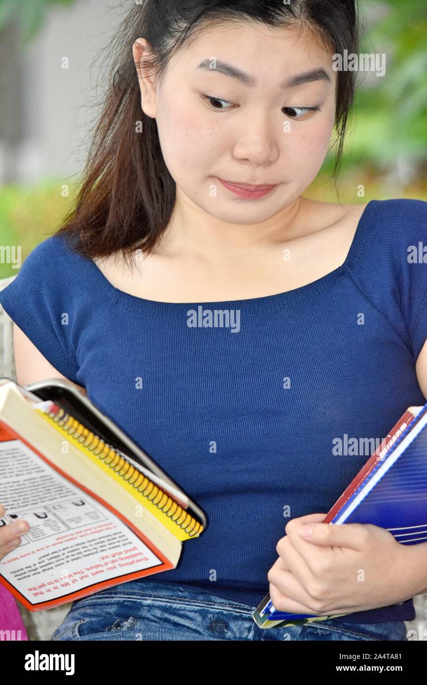 Cute Chinese Student Teenager School Girl Making A Decision Stock Photo ...