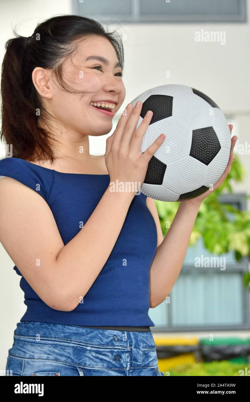 Smiling Chinese Female Soccer Player Stock Photo - Alamy