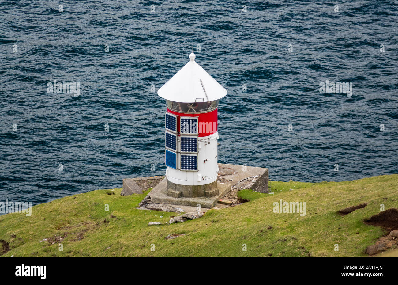 Isolated autonomous small lighthouse with solar cells Stock Photo - Alamy