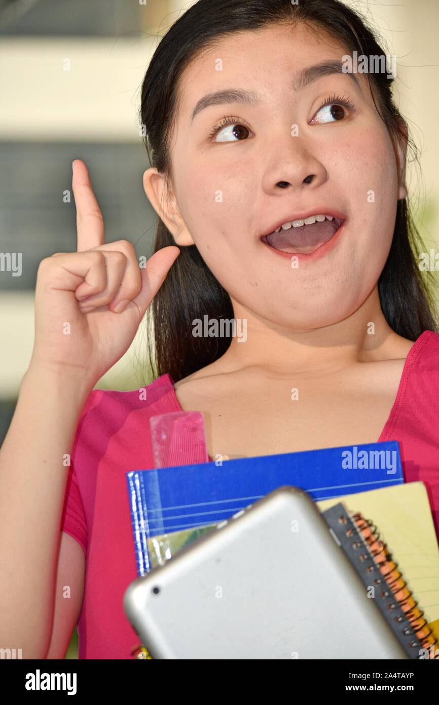 Creative Female Student With Notebooks Stock Photo - Alamy