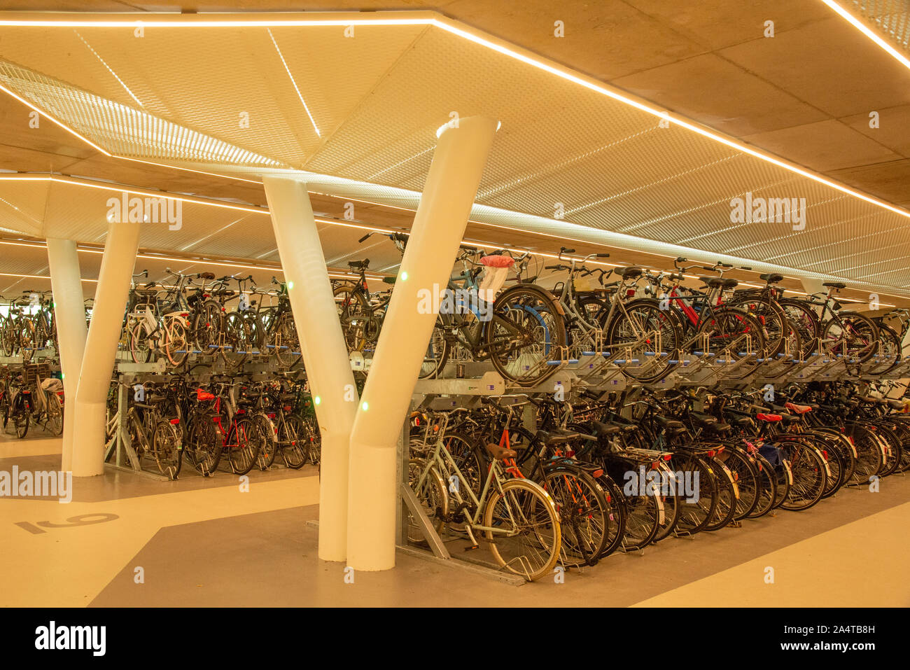 large underground bicycle parking place at station in Amsterdam ...