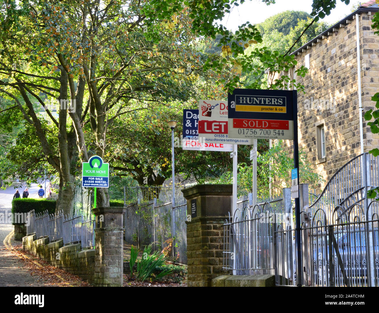 House for sale and let signs Stock Photo - Alamy