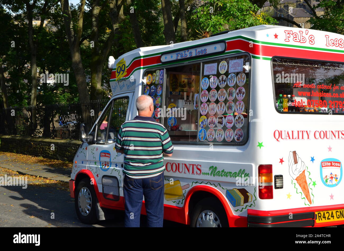 Ice cream van and customer Stock Photo - Alamy