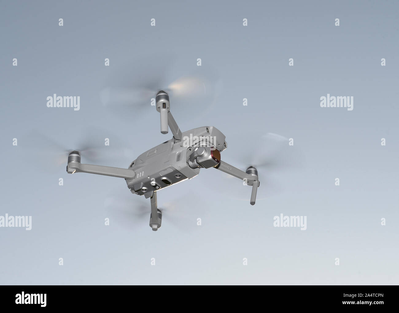 A modern drone in flight Stock Photo - Alamy