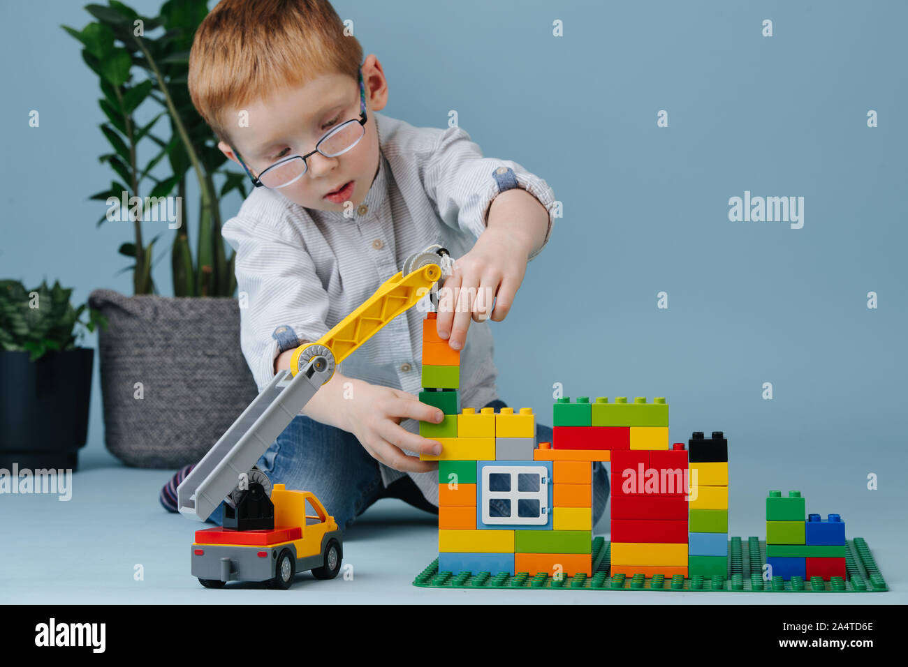 Child assembling toy hi-res stock photography and images - Alamy