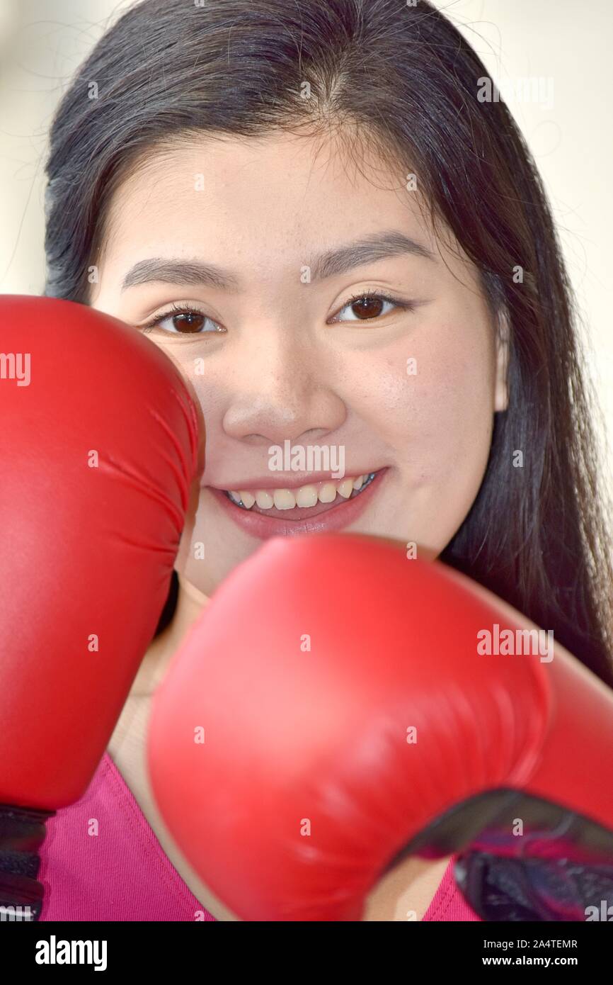 Chinese Female Athlete Smiling Wearing Boxing Gloves Stock Photo - Alamy