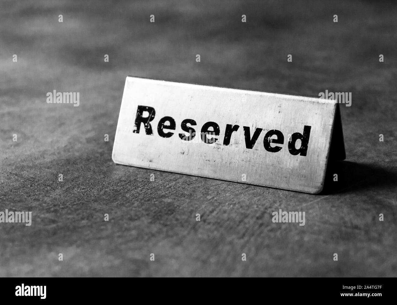 Reserved table sign in restaurant, silver reserved plate, black and ...