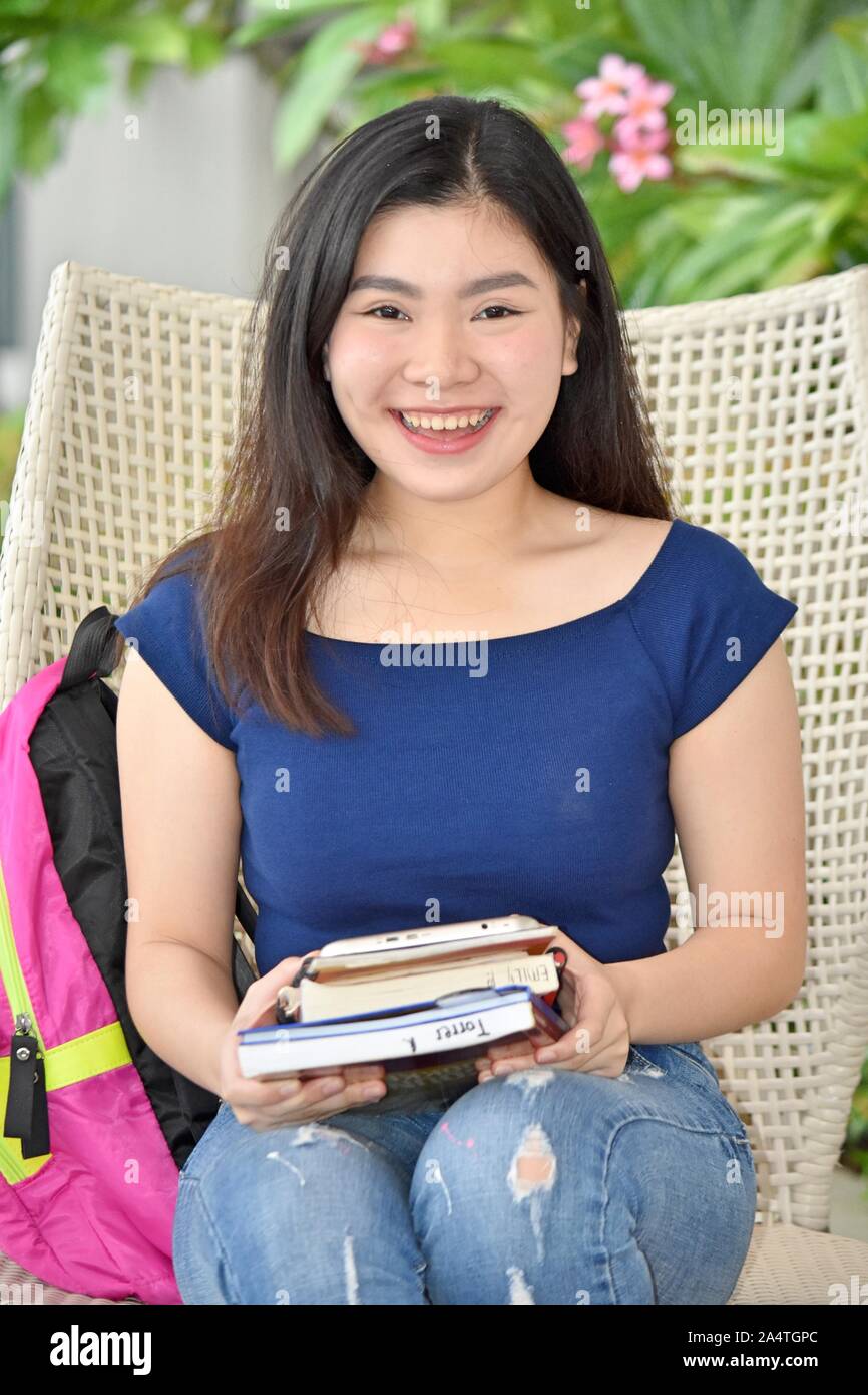 Young Chinese Female Student Smiling Stock Photo - Alamy