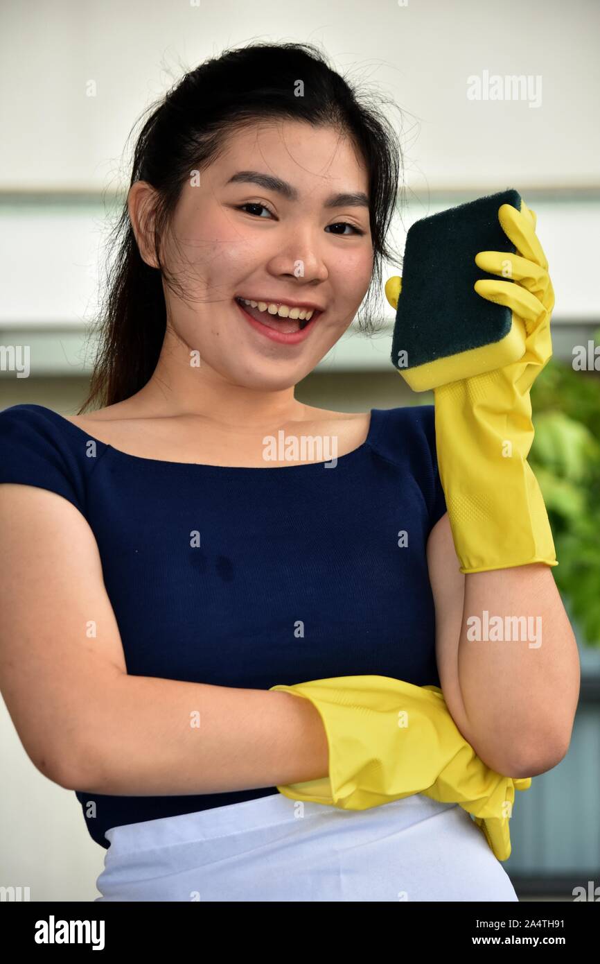 An Attractive Asian Female Cleaning Stock Photo - Alamy