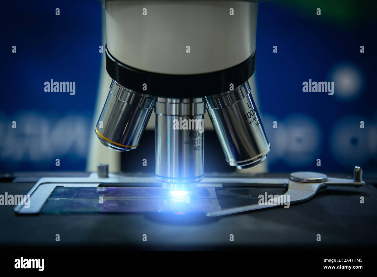 Scientific or medical test sample under light microscope in laboratory ...