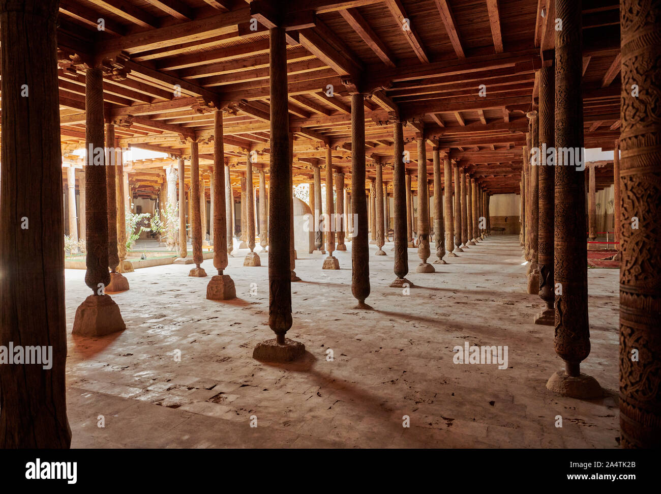 old carved wooden columns in Djuma Mosque old town Khiva, Itchan-Kala ...