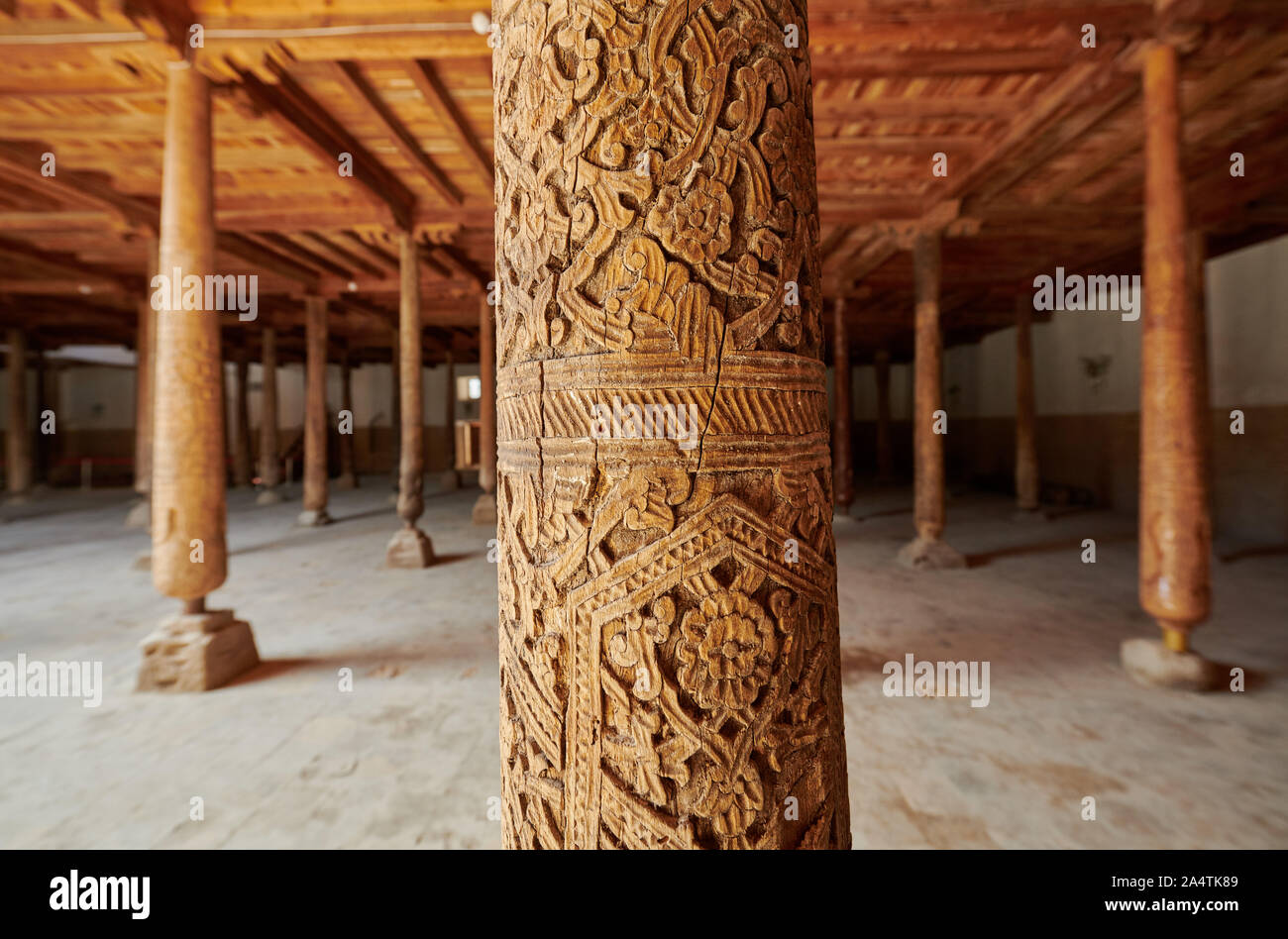 old carved wooden columns in Djuma Mosque old town Khiva, Itchan-Kala ...