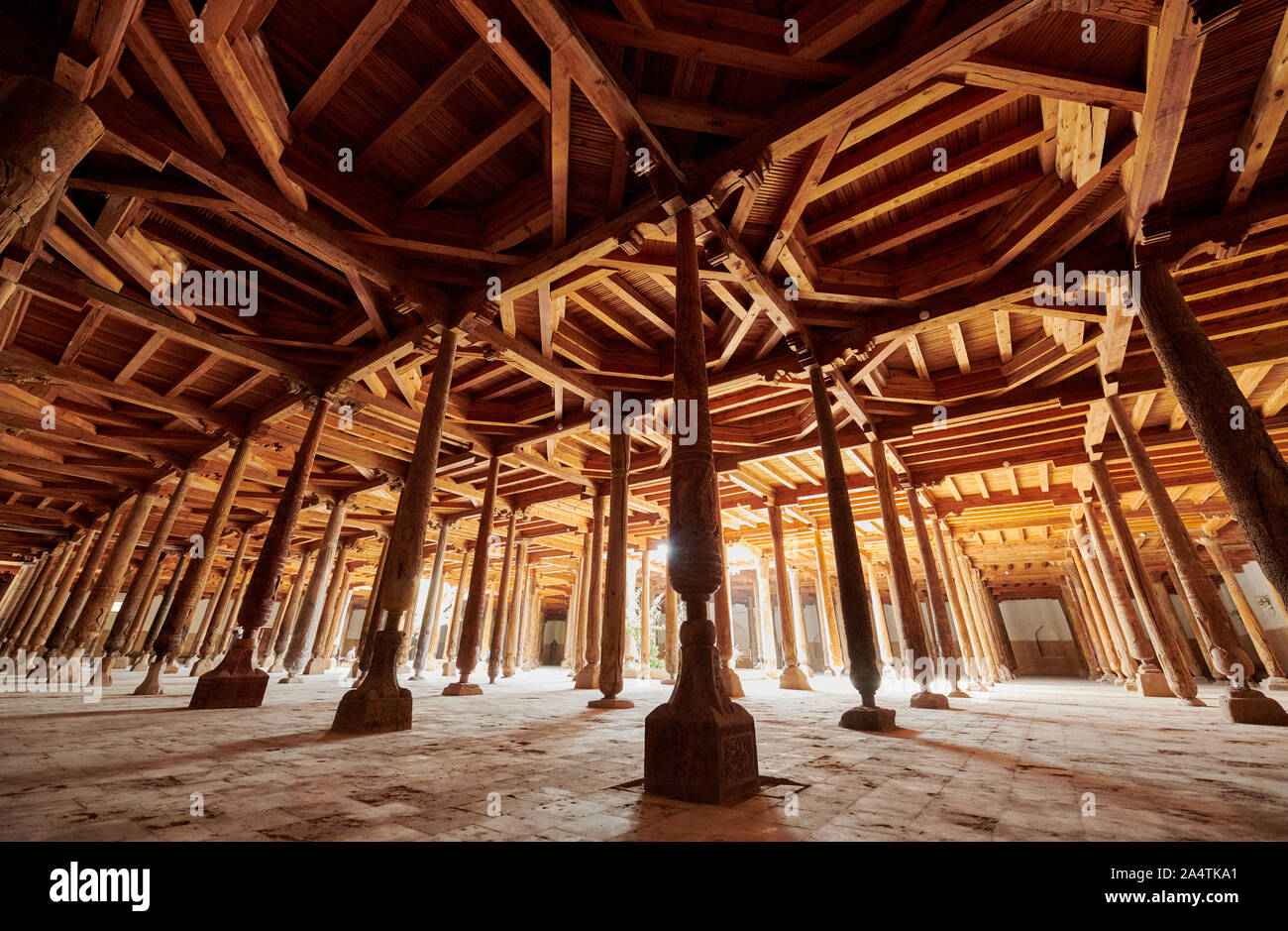 old carved wooden columns in Djuma Mosque old town Khiva, Itchan-Kala ...