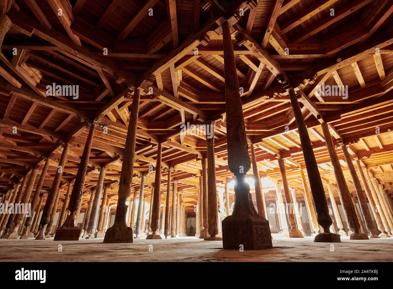 old carved wooden columns in Djuma Mosque old town Khiva, Itchan-Kala ...