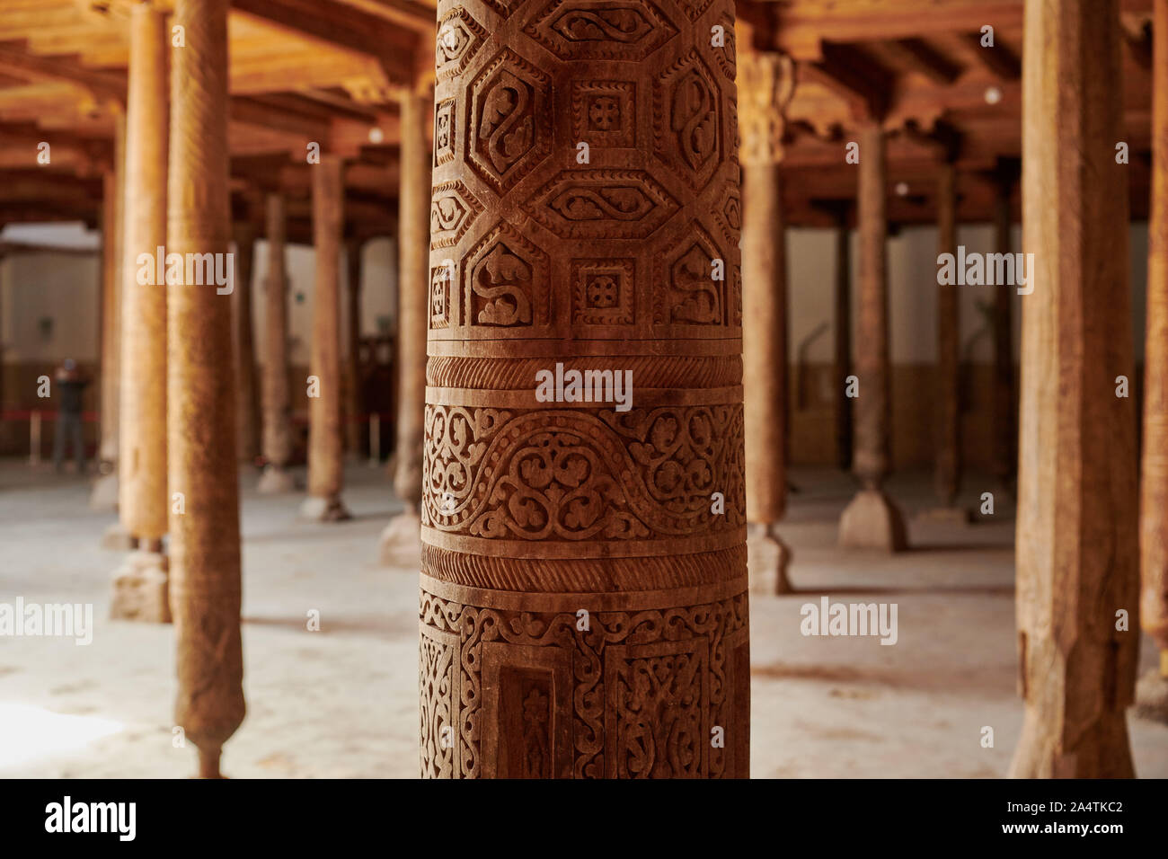 old carved wooden columns in Djuma Mosque old town Khiva, Itchan-Kala ...