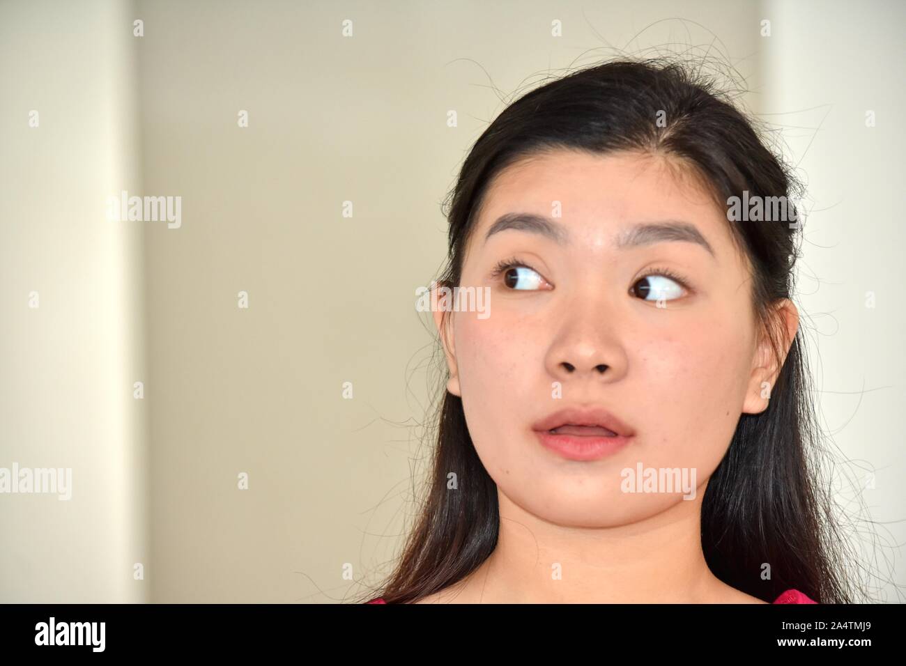 Staring Beautiful Asian Female Stock Photo - Alamy