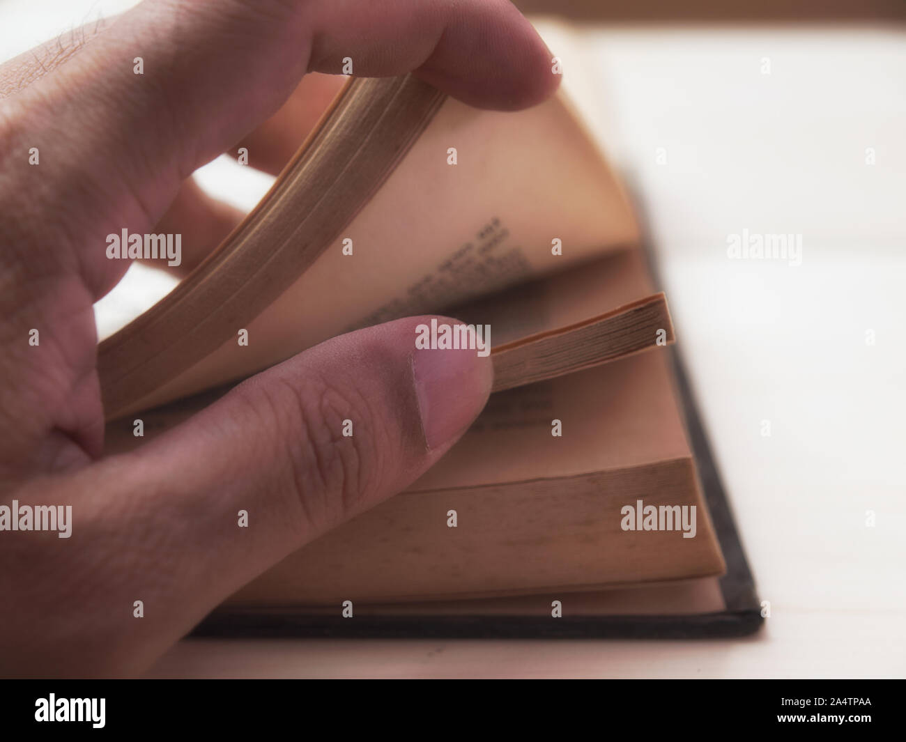 hand open book , on a desk Stock Photo - Alamy