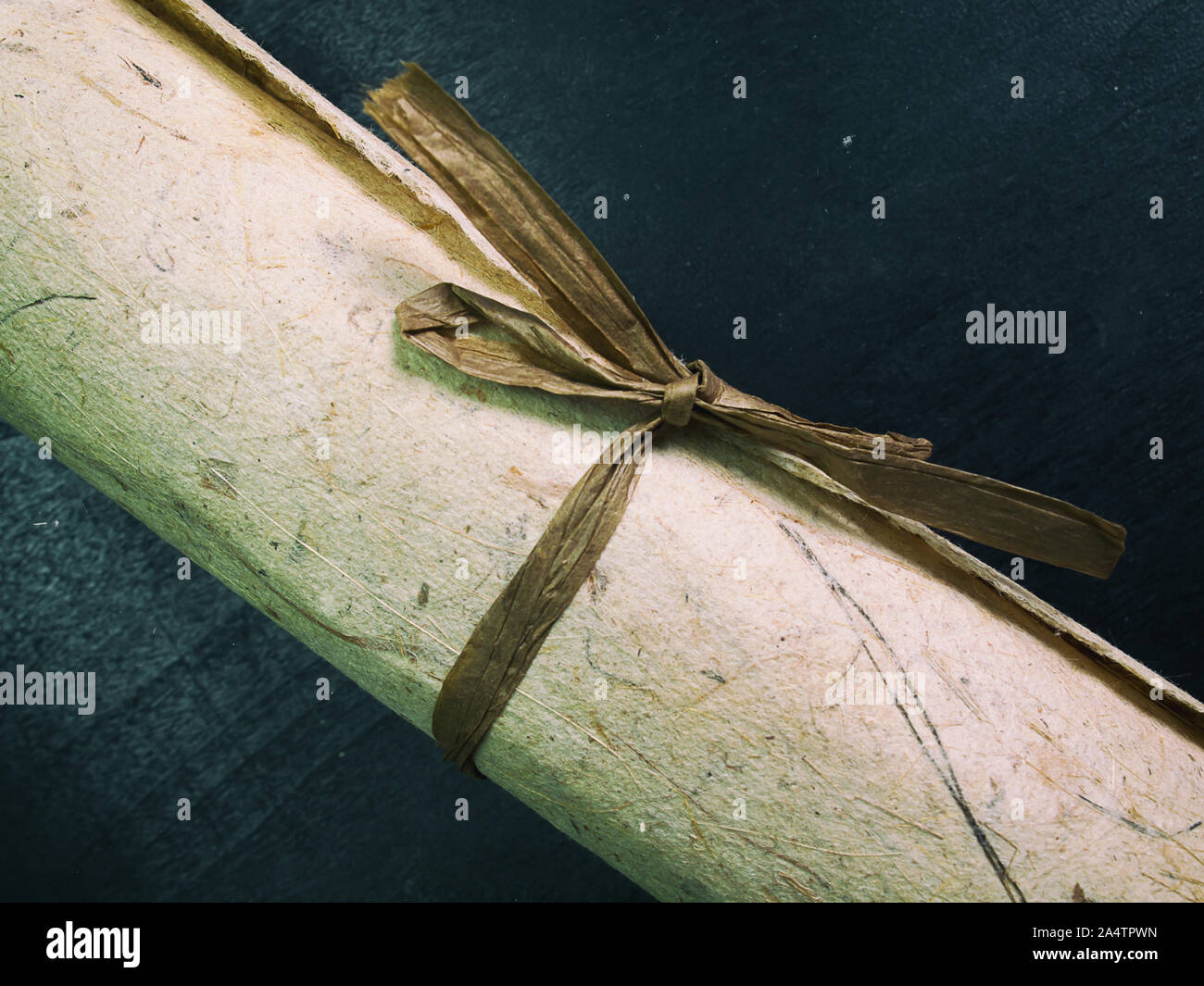 old rolled paper , Black background. (vintage Stock Photo - Alamy