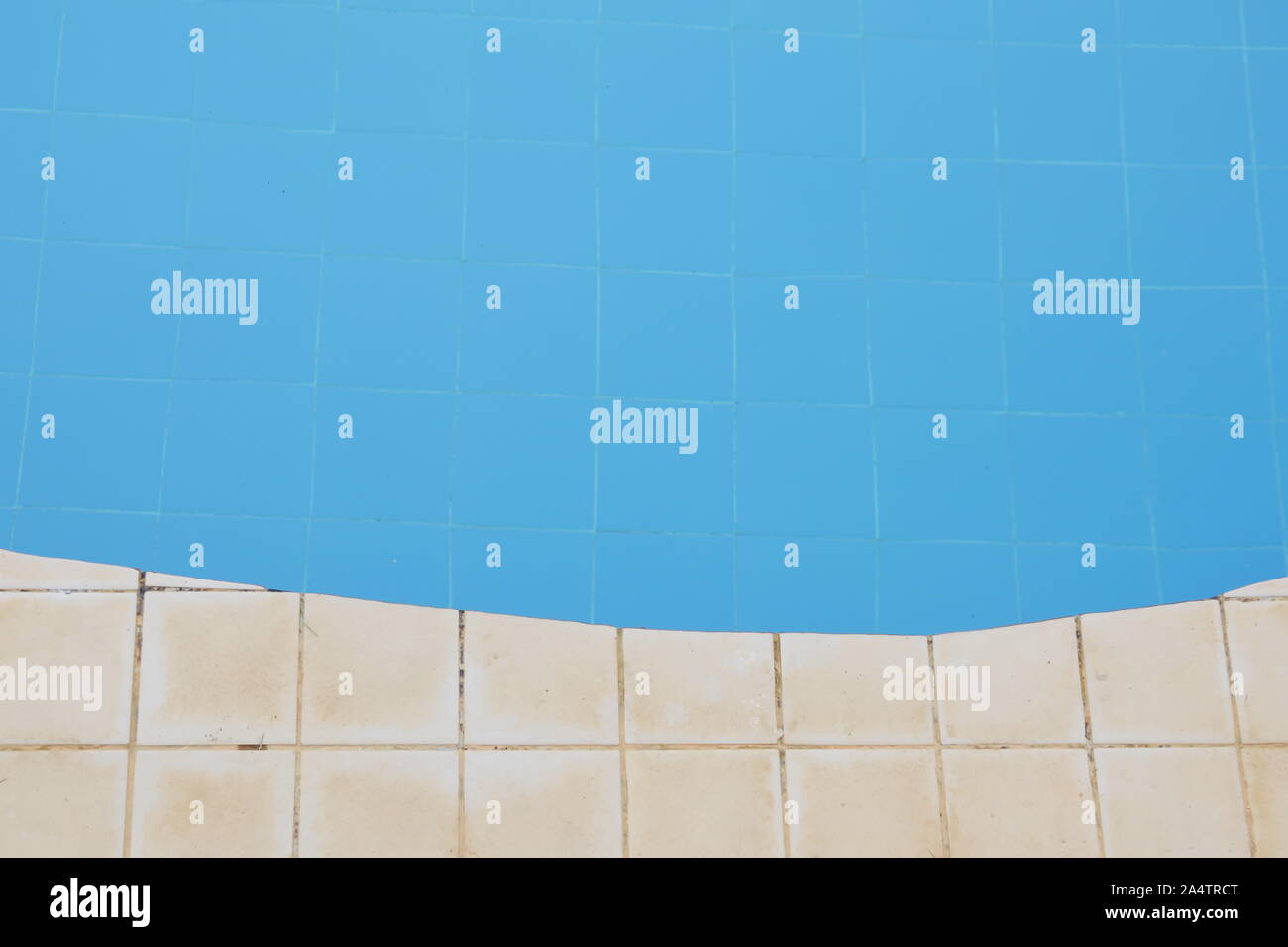 curve edge of blue tile pool Stock Photo - Alamy