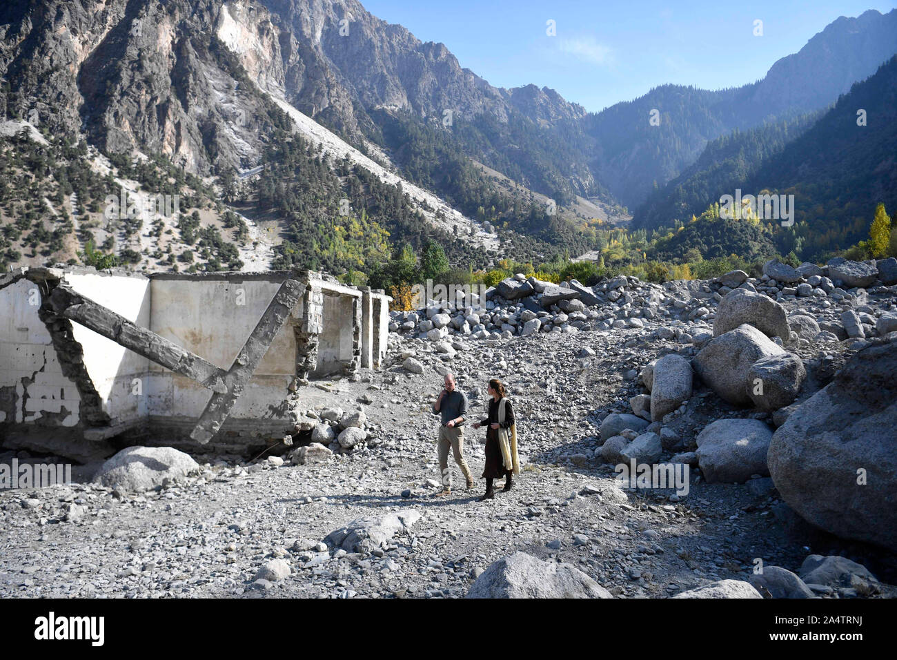 The Duke and Duchess of Cambridge walk amongst flood damaged ruins in Bumburet village in the ...