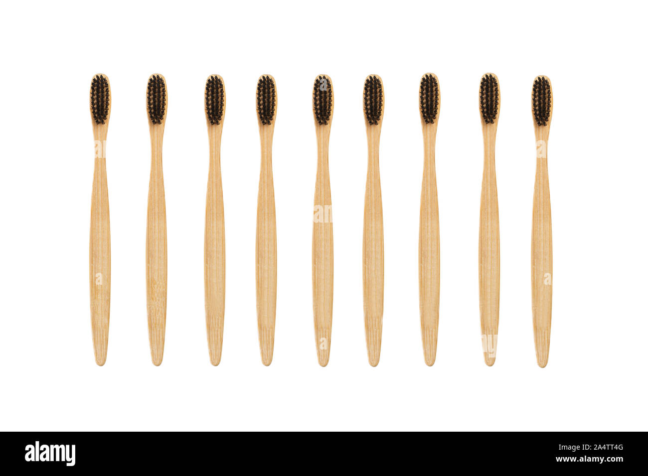 Bamboo toothbrushes with black bristles on an isolated view Stock Photo ...