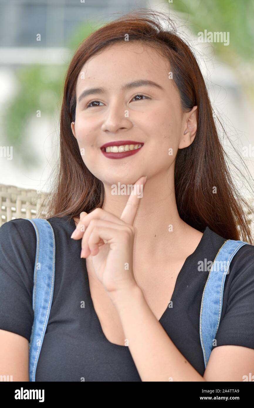 Filipina Female Deciding Stock Photo - Alamy