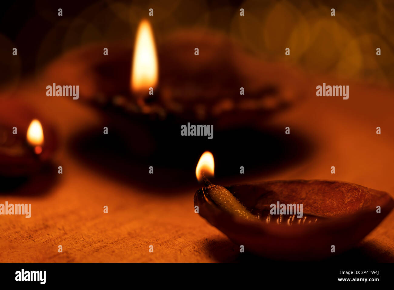 Traditional Diwali Oil lamps or diya lit on the occasion of diwali ...