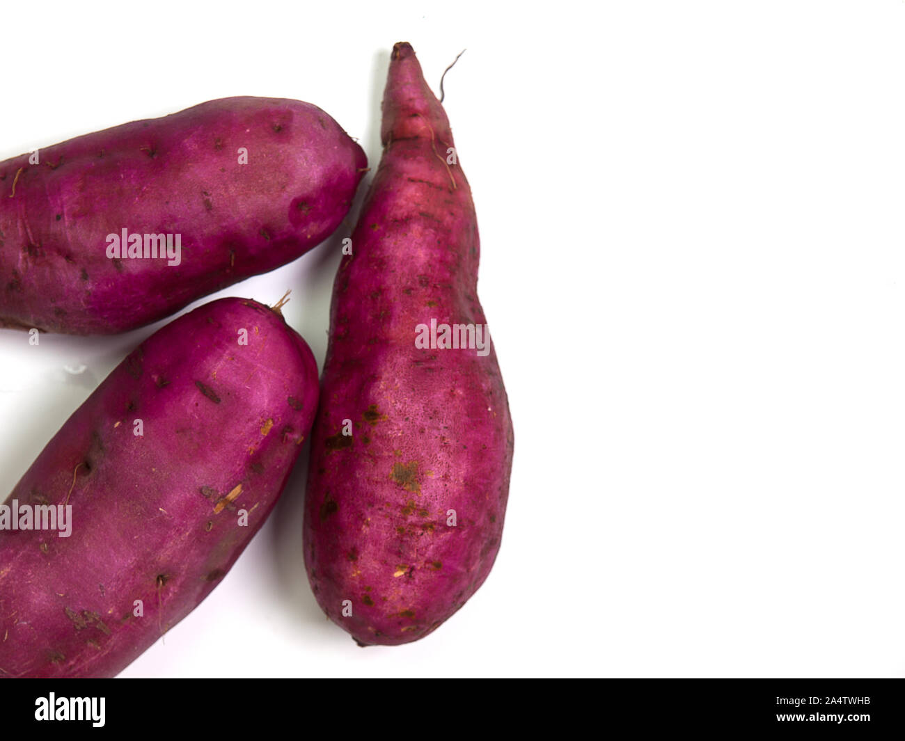Fresh yams , isolated on a white background. (View with copy space ...