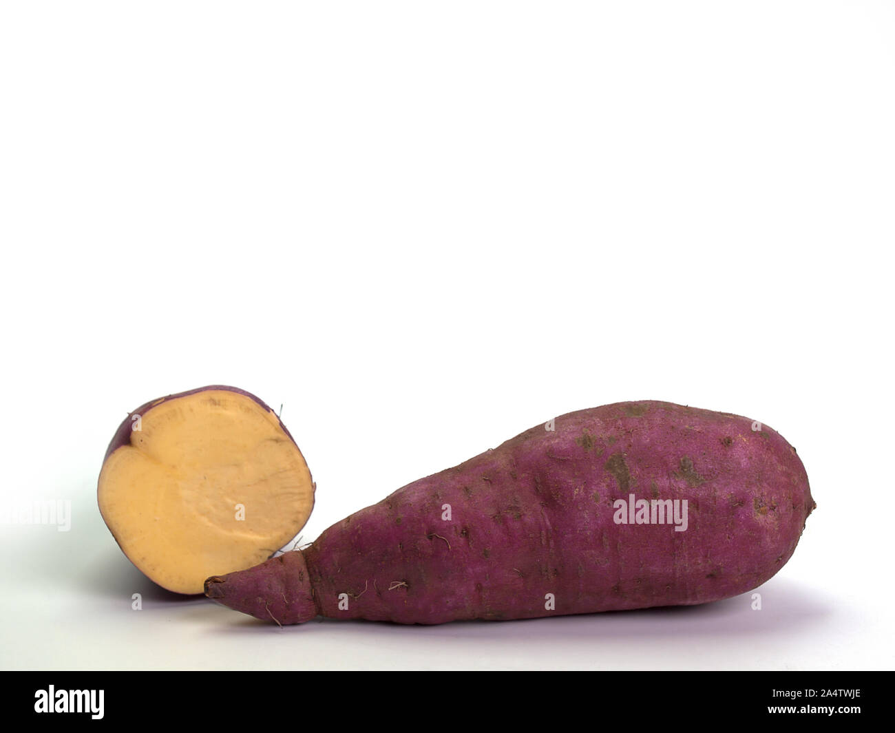 Fresh yams , isolated on a white background Stock Photo - Alamy