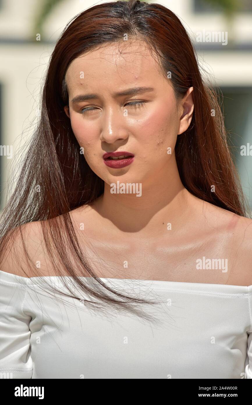 Tired Asian Female Stock Photo - Alamy