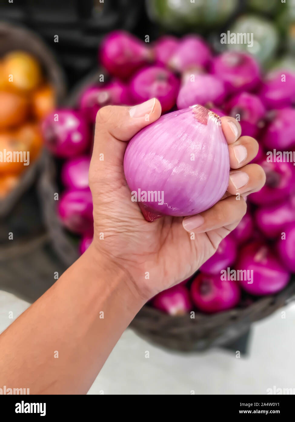 Holding onion hi-res stock photography and images - Alamy